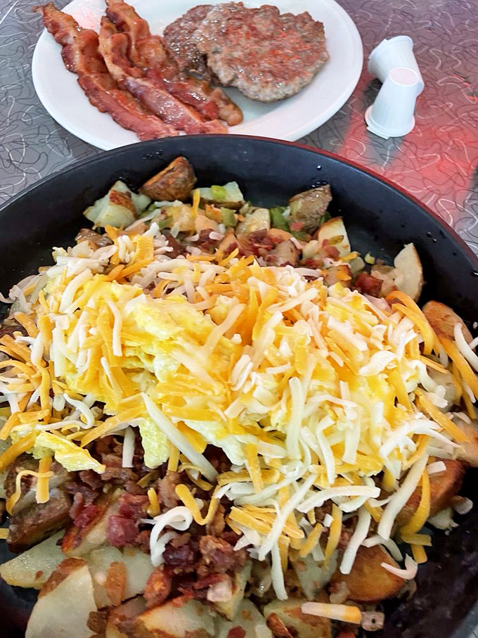 This isn't just breakfast&mdash;it's a masterpiece of morning engineering. Enough cheese to make Wisconsin nervous.