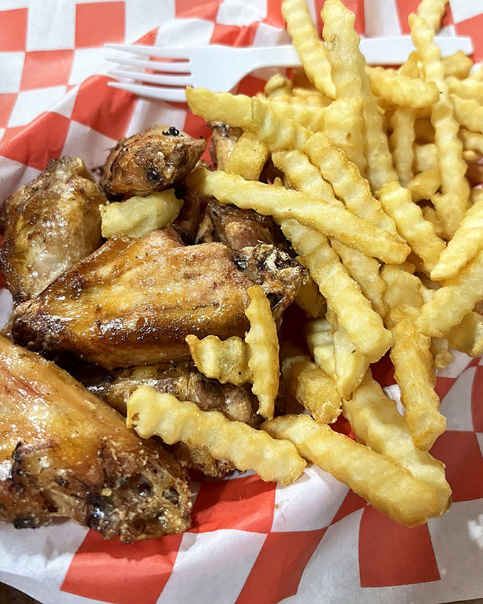 Wings so perfectly smoked, they make you wonder why anyone would ever fry them. Paired with fries that crackle with each bite.