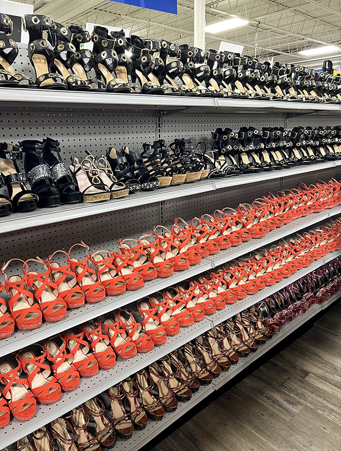Women's shoes lined up like soldiers ready for their next mission: making someone feel like Cinderella without the midnight deadline.