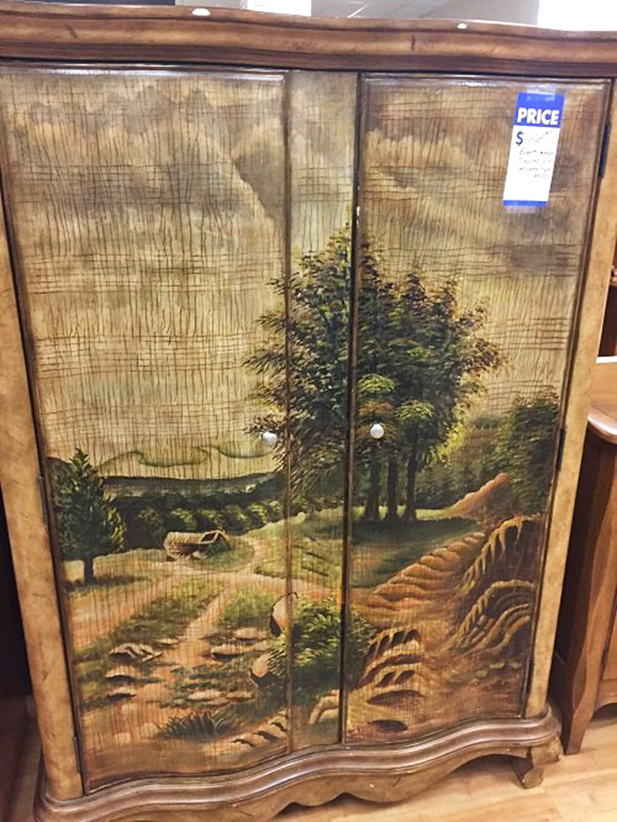 Hand-painted countryside scene that transforms an ordinary cabinet into a storytelling piece. It's like wearing art without hanging it.