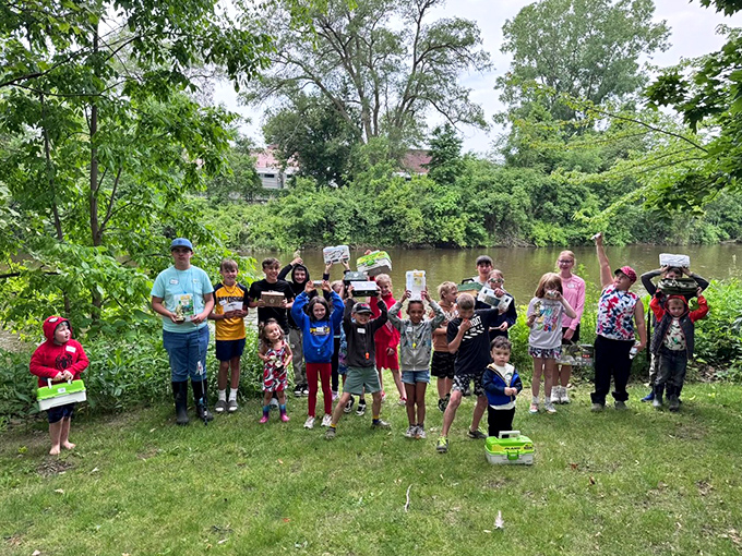 These young anglers along the Shiawassee River are learning patience, hope, and the art of telling increasingly elaborate fish stories.