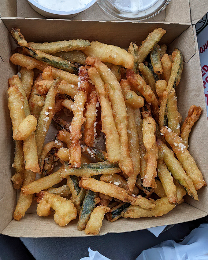 Zucchini fries—where vegetable virtue meets deep-fried indulgence. The perfect compromise for when your conscience and cravings are at war.