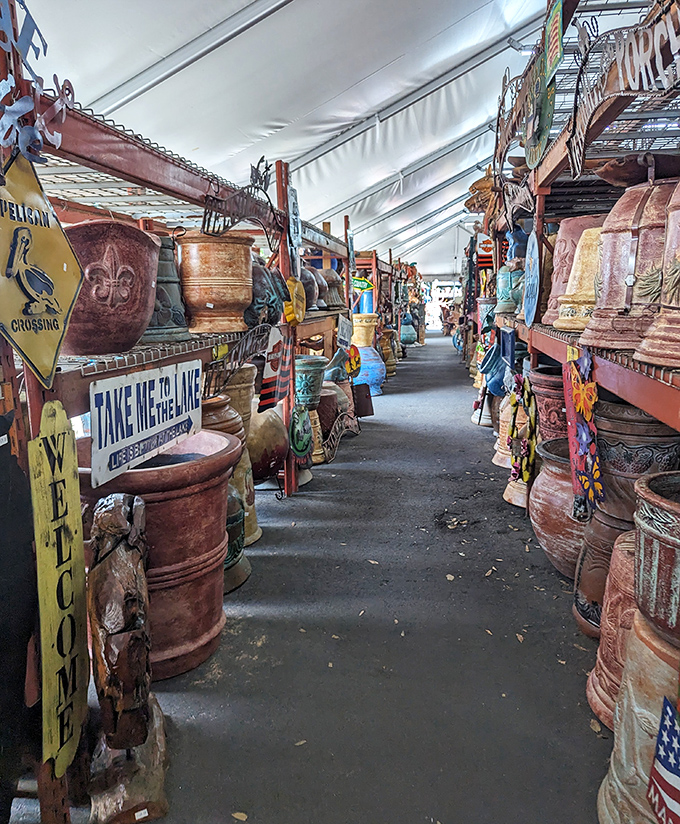 Walking this aisle feels like exploring a pottery museum where everything's for sale and "Take Me to the Lake" isn't just a sign, but a lifestyle.