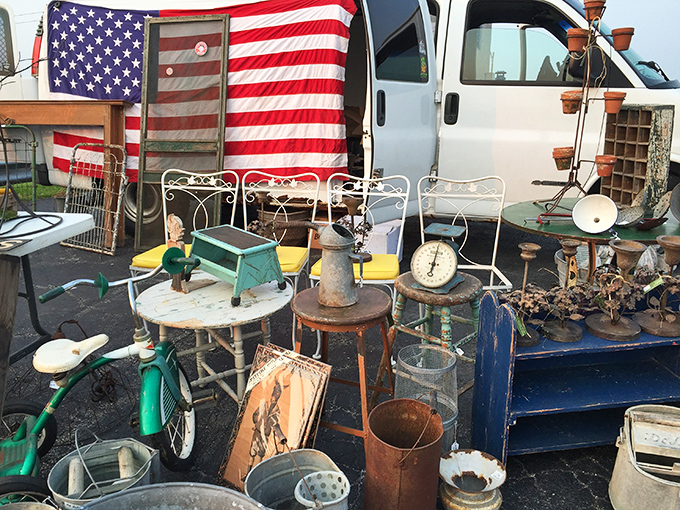 Americana on display&mdash;where rusty treasures, vintage scales, and weathered flags create a time capsule of nostalgic design.