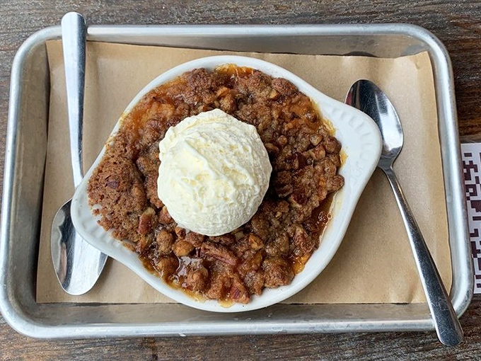 A warm apple crumble that doesn't need fancy plating to tell you it's about to become the comfort food memory you measure all others against.