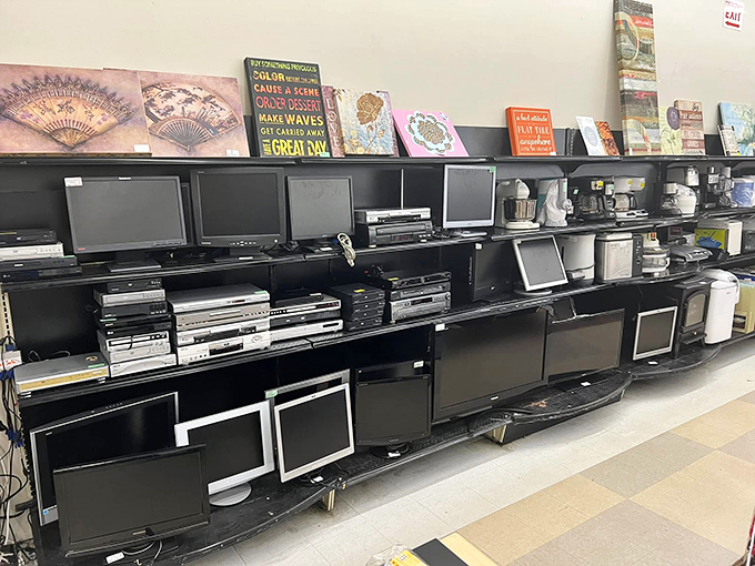 The electronics graveyard &ndash; where yesterday's cutting-edge technology comes to find new purpose. That row of TVs has witnessed everything from "Friends" to "Game of Thrones."