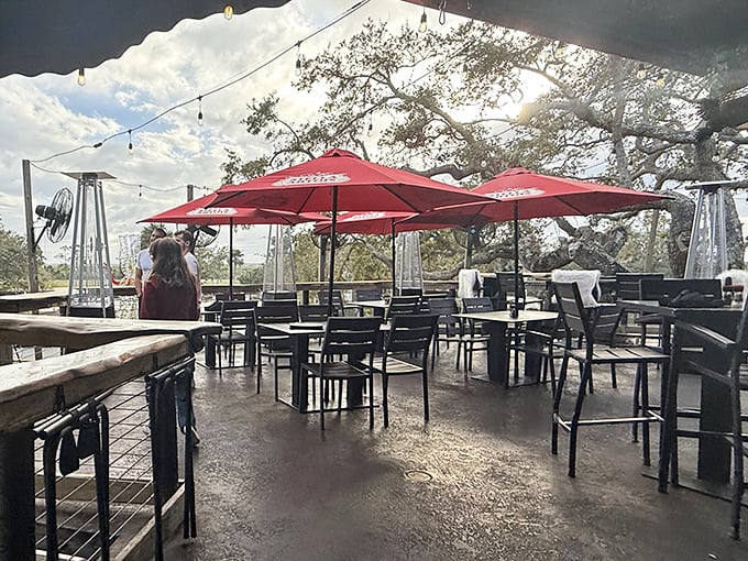 Rain or shine, this covered deck offers al fresco dining with a side of Florida sky and a sprinkle of oak leaf shade.