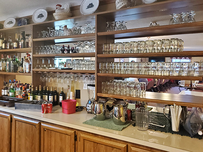 The bar area stands ready with an impressive array of glassware&mdash;because nothing complements fried chicken quite like your beverage of choice.