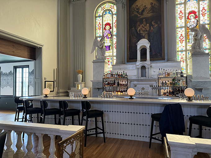 The bar area marries sacred and spirited, with stained glass windows watching over masterfully crafted cocktails&mdash;divine intervention of the delicious kind.