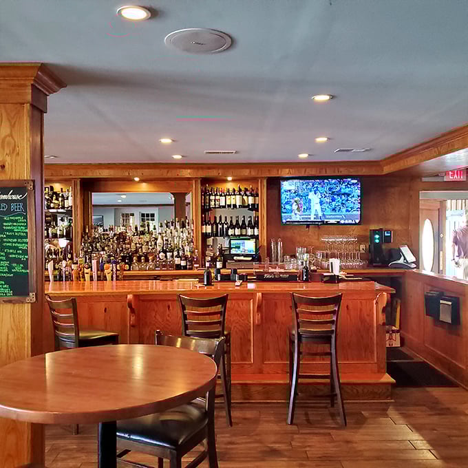 The bar area combines rustic wood with modern amenities &ndash; the perfect spot to debate whether you have room for dessert (spoiler alert: you do).