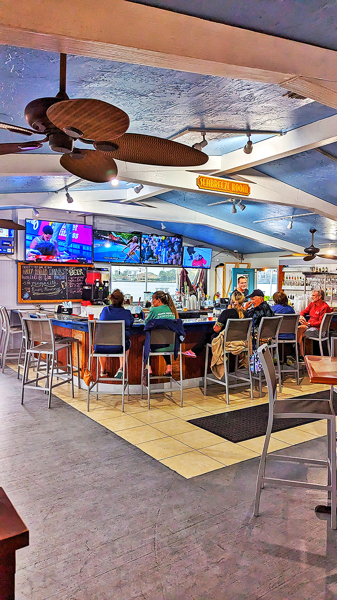 The bar where locals gather to debate important matters like which fish is running and who makes the best margarita in town.