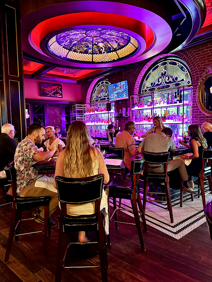 The bar glows with possibility and premium spirits. Where deals are made, celebrations begin, and bourbon educations happen nightly.