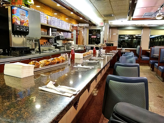 The counter offers front-row seats to the culinary action&mdash;where regulars perch on mint-green stools and staff members pour coffee with telepathic timing.