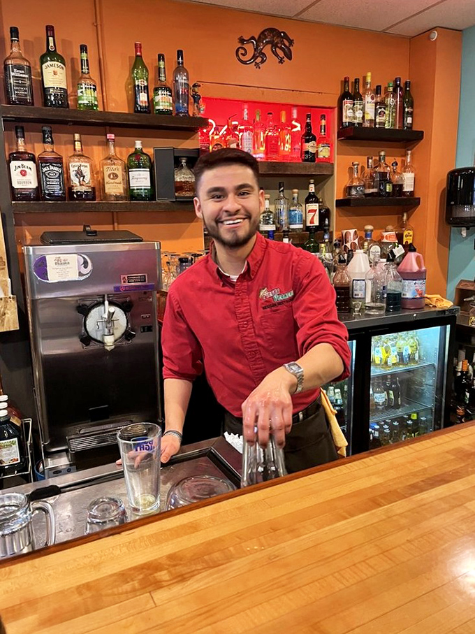 Behind every great Mexican restaurant is a bartender with the power to transform your Tuesday. That smile isn't just friendly&mdash;it's the prelude to your perfect margarita.
