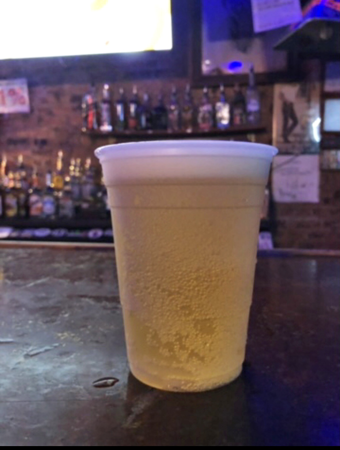 A cold beer in a frosty cup—sometimes the simplest pleasures are the most profound. The perfect companion to Adair's legendary burgers.