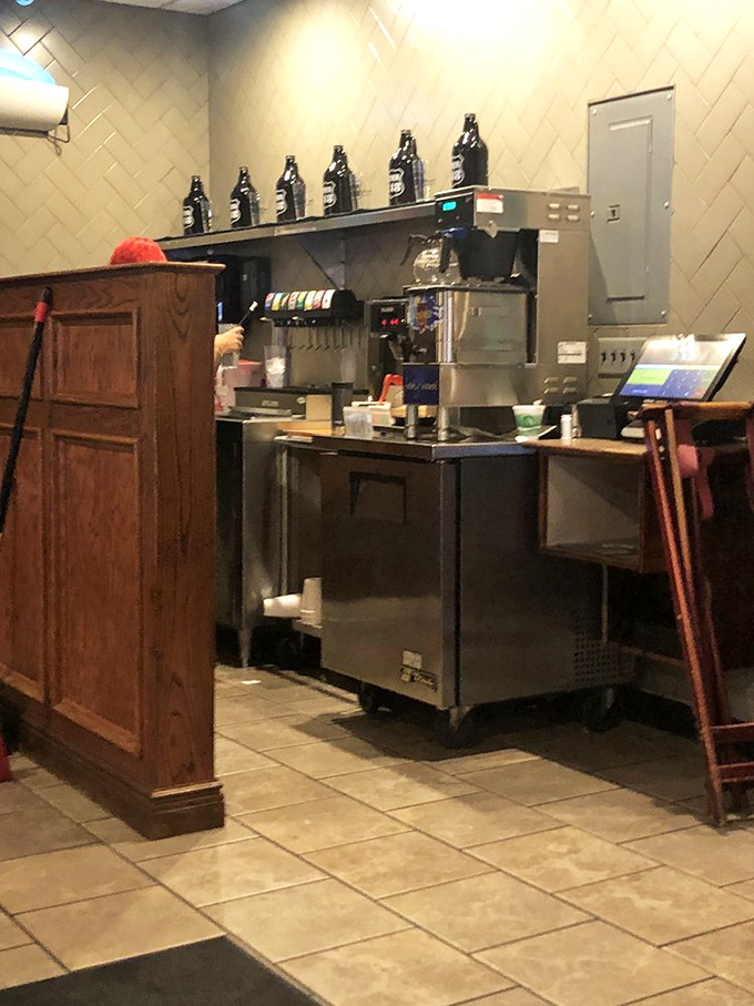 The humble beverage station: unsung hero of diner civilization and keeper of the sacred coffee that transforms morning zombies into functioning humans.
