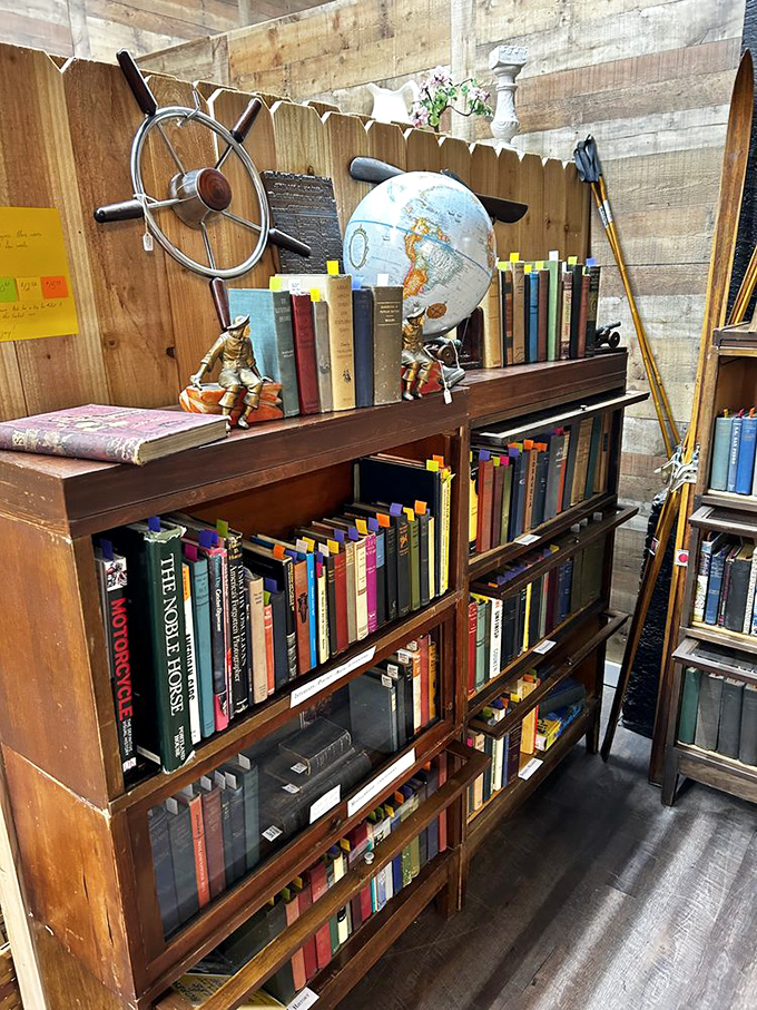 Books, globes, and a ship's wheel—this literary corner isn't just a library, it's an adventure waiting to happen.
