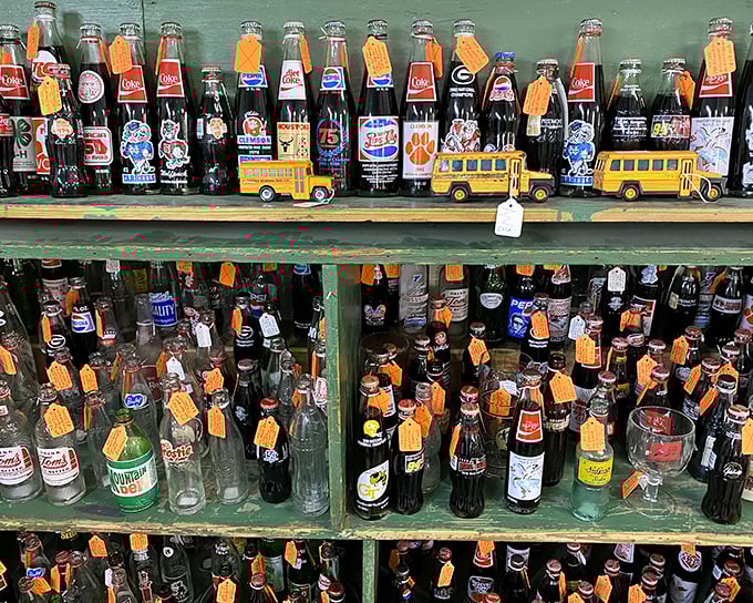 A fizzy timeline of American pop culture, where Coca-Cola bottles meet college football pride in a distinctly Georgian display.