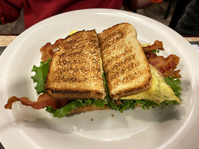 This sandwich isn't just stacked&mdash;it's architecturally sound. Crispy bacon and fresh lettuce create the perfect textural contrast between perfectly toasted bread.