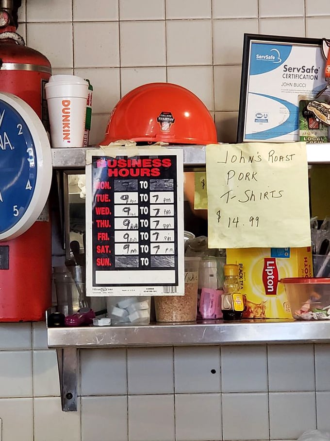 The business hours sign tells you when sandwich magic happens. Note them carefully&mdash;missing your window would be a tragedy.