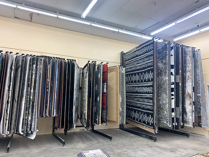 Carpet samples stand at attention like fabric soldiers, each pattern vying to become the next addition to your home's flooring story.