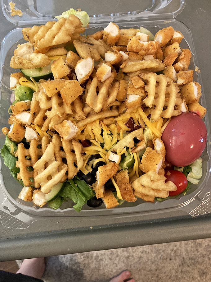 This isn't just a salad&mdash;it's a texture playground where crispy waffle fries, crunchy greens, and tender chicken create the perfect bite every time.