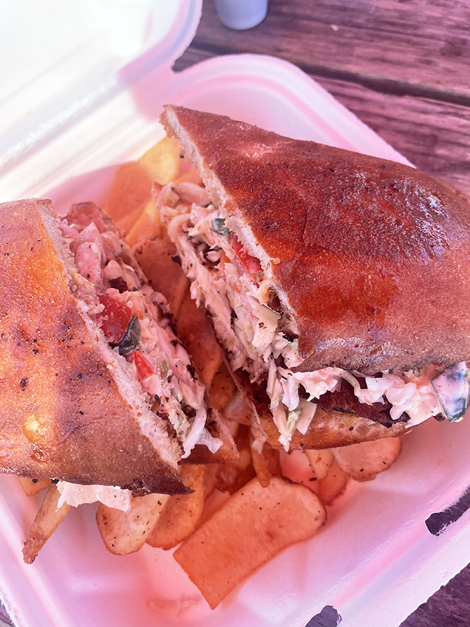 Cross-section evidence of sandwich perfection. This isn't just lunch; it's an archaeological dig through layers of flavor and texture.