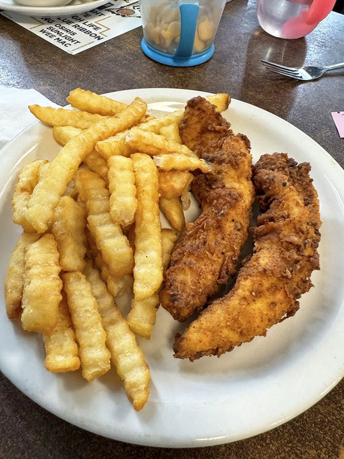 Chicken tenders and crinkle-cut fries &ndash; proof that sometimes the simplest pleasures are the most satisfying.
