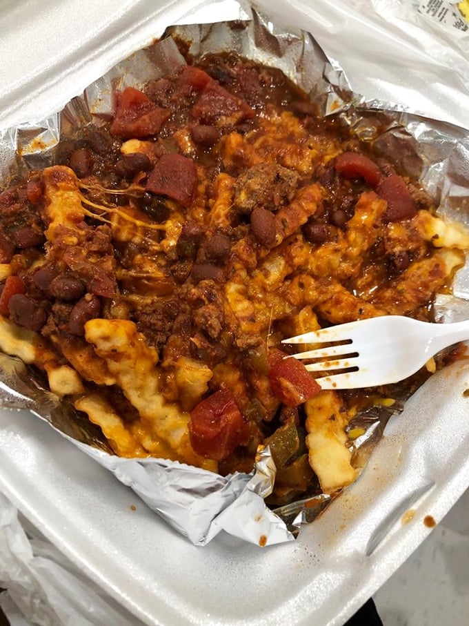 Chili cheese fries that don't mess around&mdash;a glorious mess of ground beef, beans, and melted cheese atop crispy potatoes. Fork required, no regrets allowed.