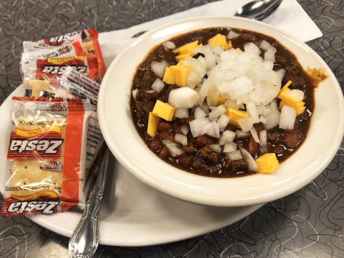 Chili that doesn't need a winter storm to justify its existence. Those diced onions and cheese are the supporting actors who deserve Oscars.