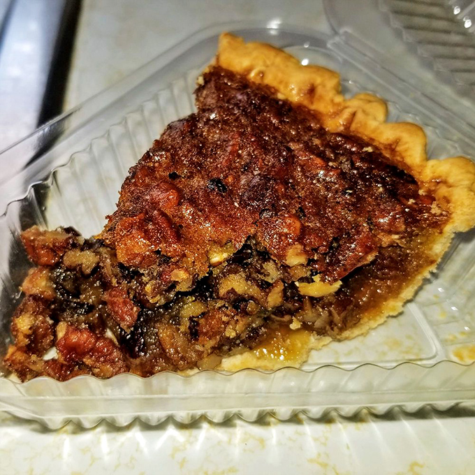 Pecan pie so rich it should come with its own tax bracket. The perfect sweet finale to a symphony of smoke and spice.