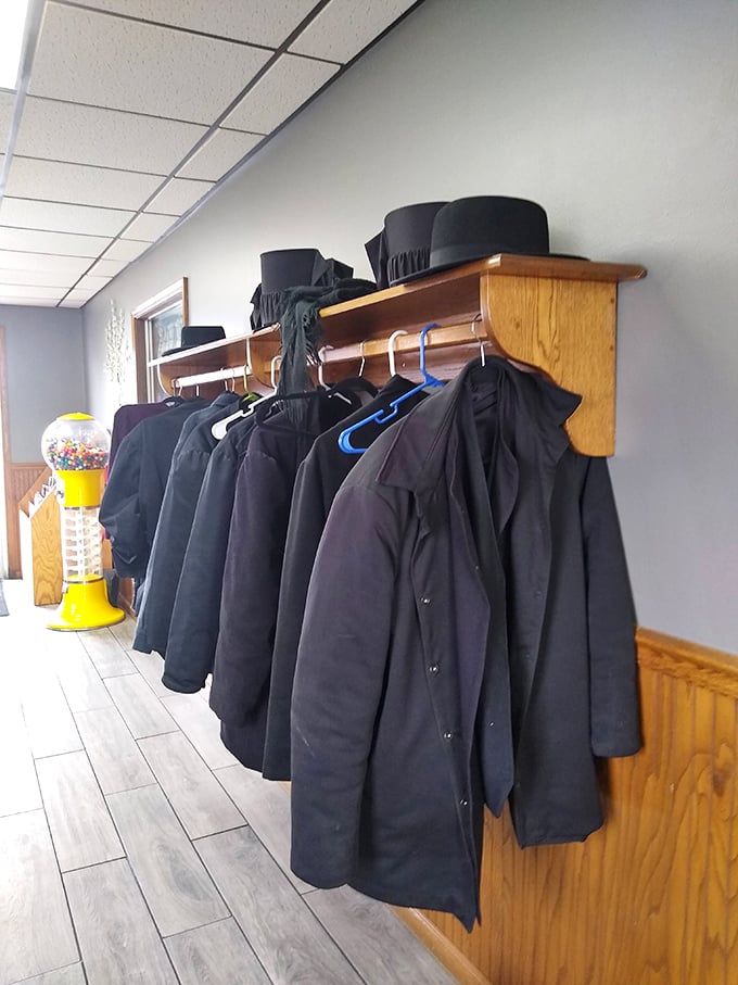 Not just coats hanging here but tradition itself&mdash;Amish hats and jackets waiting patiently while their owners enjoy hearty, homestyle meals.