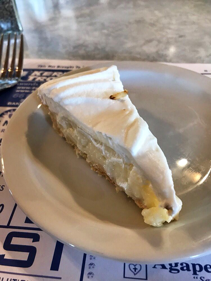 Coconut cream pie so light it might float away if not anchored by that perfect golden crust. Worth every single calorie.