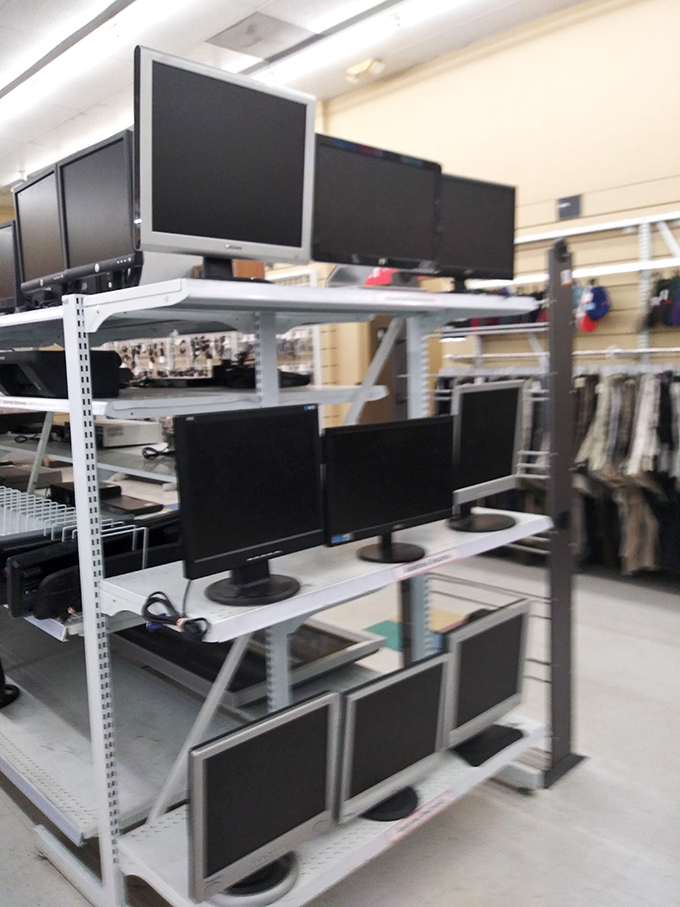 Computer monitors stacked like technological trading cards&mdash;yesterday's cutting edge becoming today's affordable option for budget-conscious shoppers.