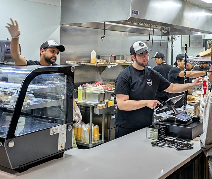 The counter—that magical threshold between hunger and satisfaction. Where orders are placed and cheesesteak dreams come true.