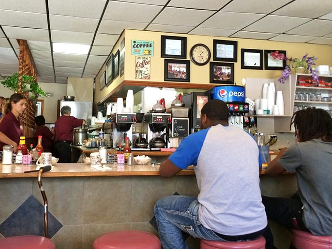 The counter isn't just for solo diners—it's front-row seating to the greatest show in town, where coffee flows freely and conversation is always on the menu.