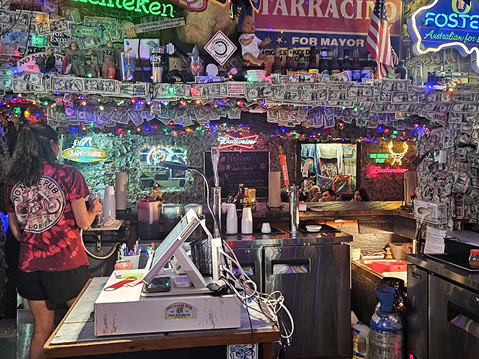 Behind this bar, magic happens&mdash;cocktails are crafted and stories are shared under a canopy of cash that's been accumulating for decades.