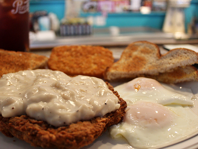 Country fried steak smothered in gravy that could solve international conflicts. Add eggs and you've got a breakfast that fuels small armies.