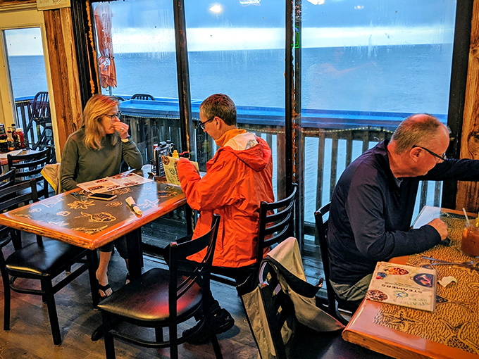 Waterfront dining where the view competes with the food for your attention. The Gulf of Mexico: nature's perfect dinner companion.