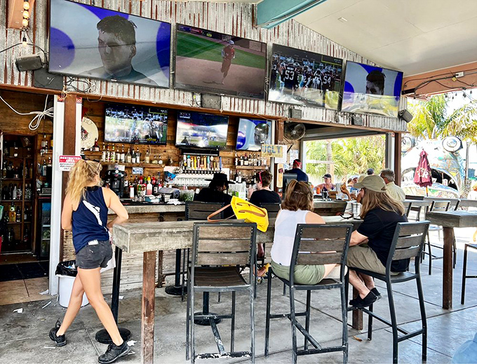 Happy diners enjoying their meals proves this place delivers on its delicious grouper promises consistently.