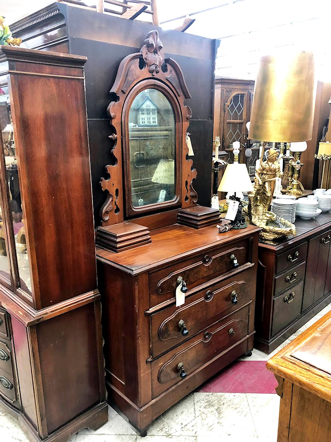 This isn't just a dresser; it's Victorian craftsmanship with a mirror that's definitely seen some history. Ghost not included, but can't be ruled out.