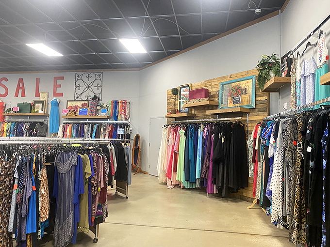 The formal wear section transforms thrift shopping into a glamorous affair, with evening gowns and cocktail dresses awaiting their next gala.