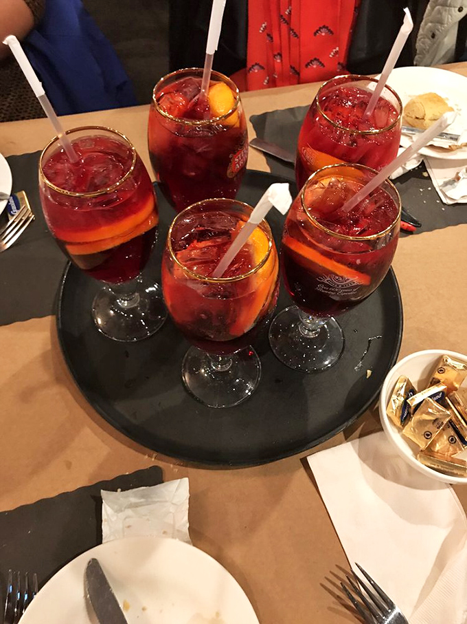 Sangria served in wine glasses the size of fishbowls&mdash;because sometimes your thirst requires more than a standard pour.
