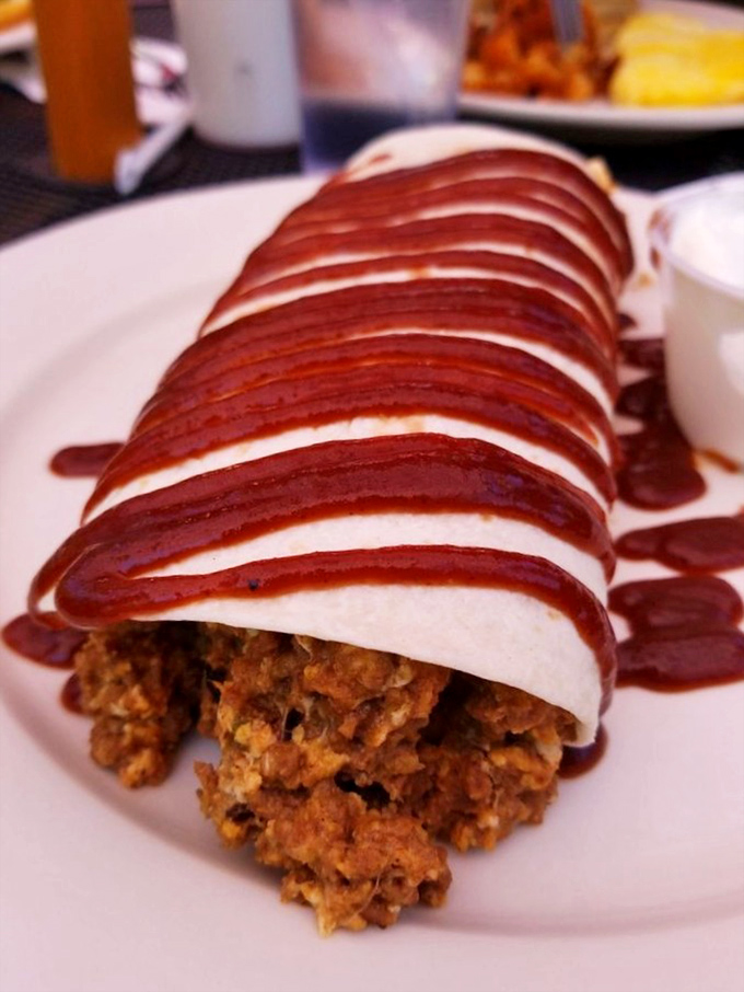 This isn't just food&mdash;it's edible architecture, where layers of filling are lovingly wrapped and drizzled with sauce that makes you want to applaud.