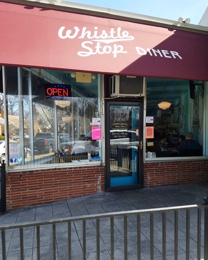 The red awning and neon "OPEN" sign&mdash;a beacon of breakfast hope on mornings when your coffee maker mysteriously stops working.