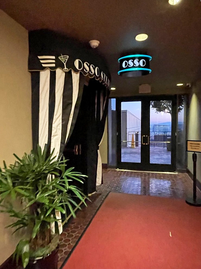 The entrance sets the stage: black and white drama, theatrical curtains, and the subtle promise that tonight, you're the star of the show.