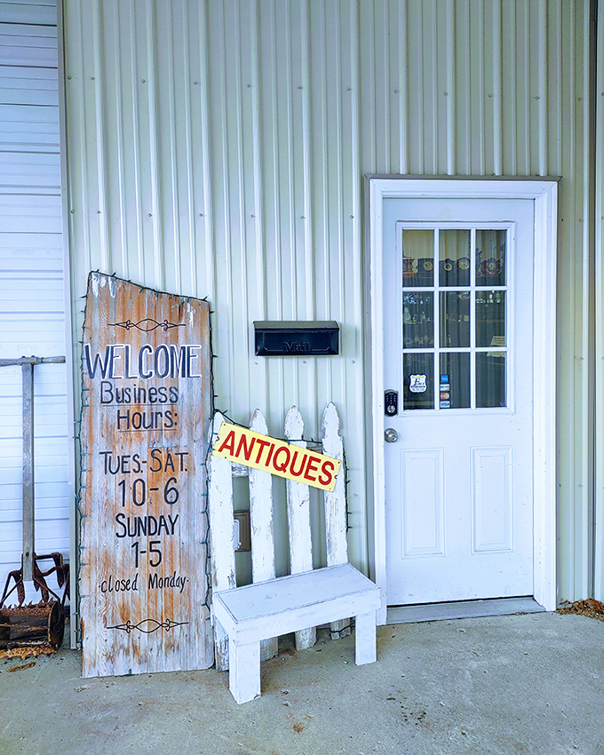 The welcoming entrance promises treasures within, where business hours become adventure hours for dedicated antique enthusiasts and casual browsers.