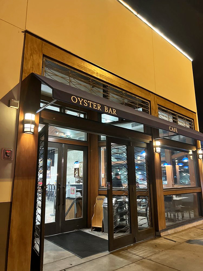 The entrance that separates ordinary days from extraordinary meals. That "Oyster Bar" sign might as well say "Happiness This Way."