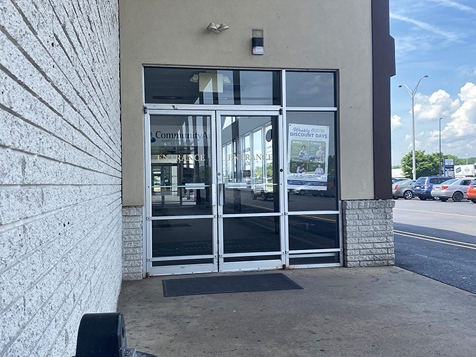 The entrance &ndash; unremarkable yet magical, like the wardrobe to Narnia but leading to vintage clothing instead of talking lions.