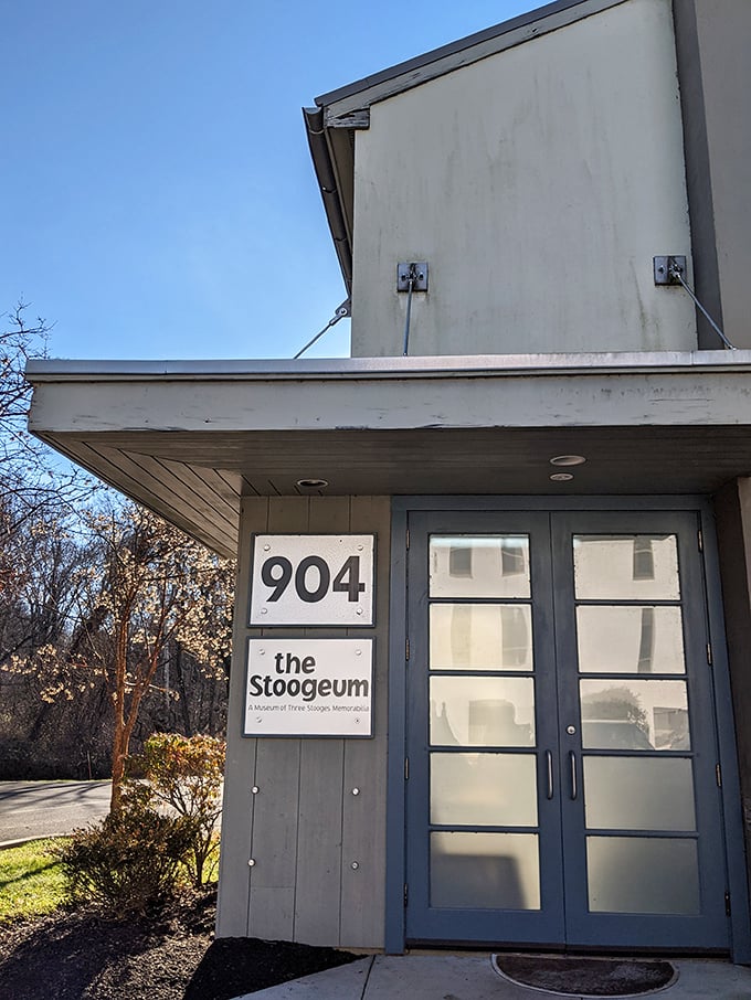 The unassuming entrance at 904 gives little hint of the wonderland of wiseguys waiting inside&mdash;comedy's most understated holy site.